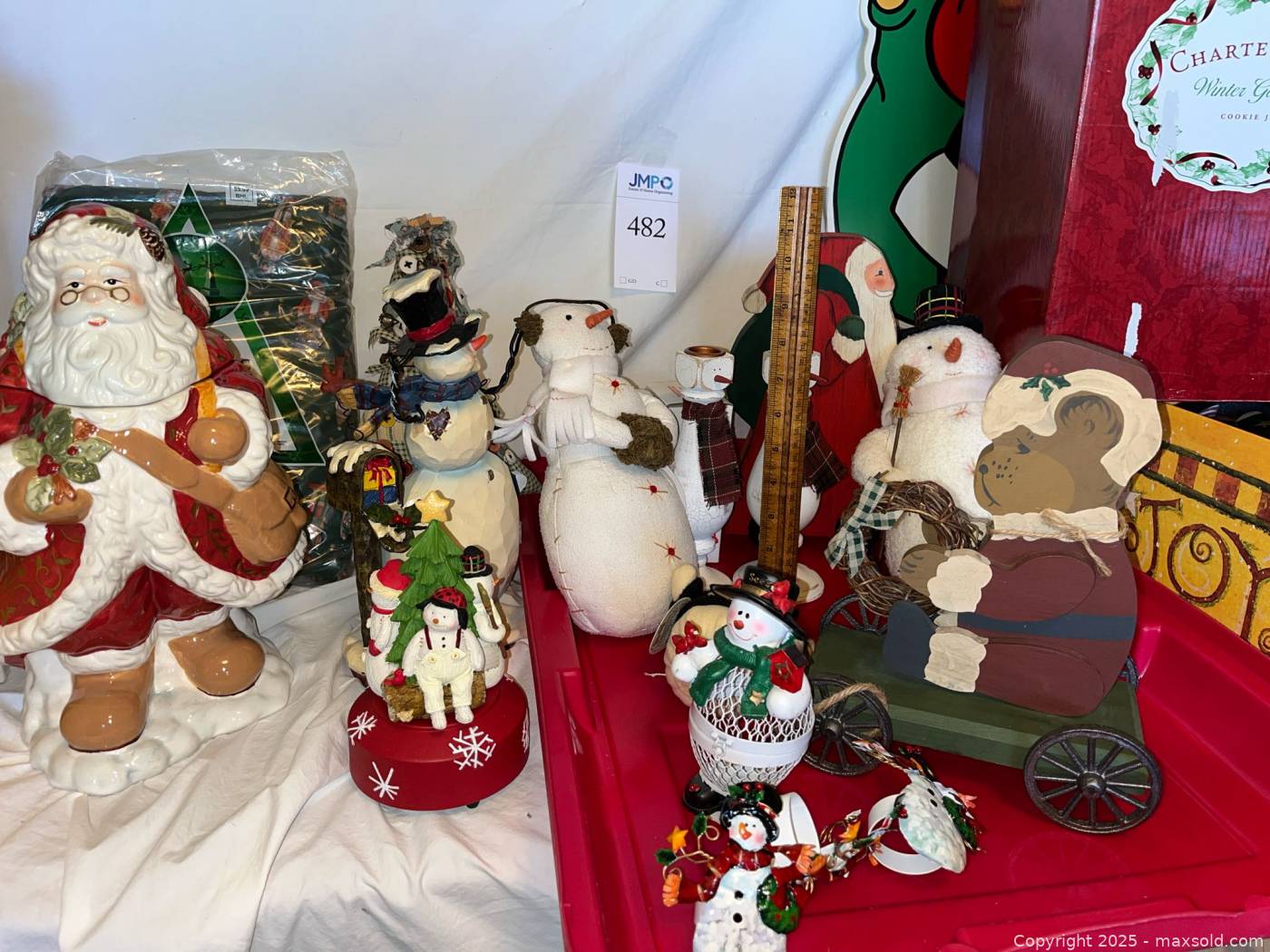 Hallmark ceramic Santa cookie jar, snowmen, wreaths, houses | Maxsold