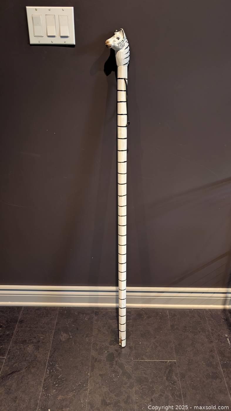 Carved wooden zebra walking stick | Maxsold