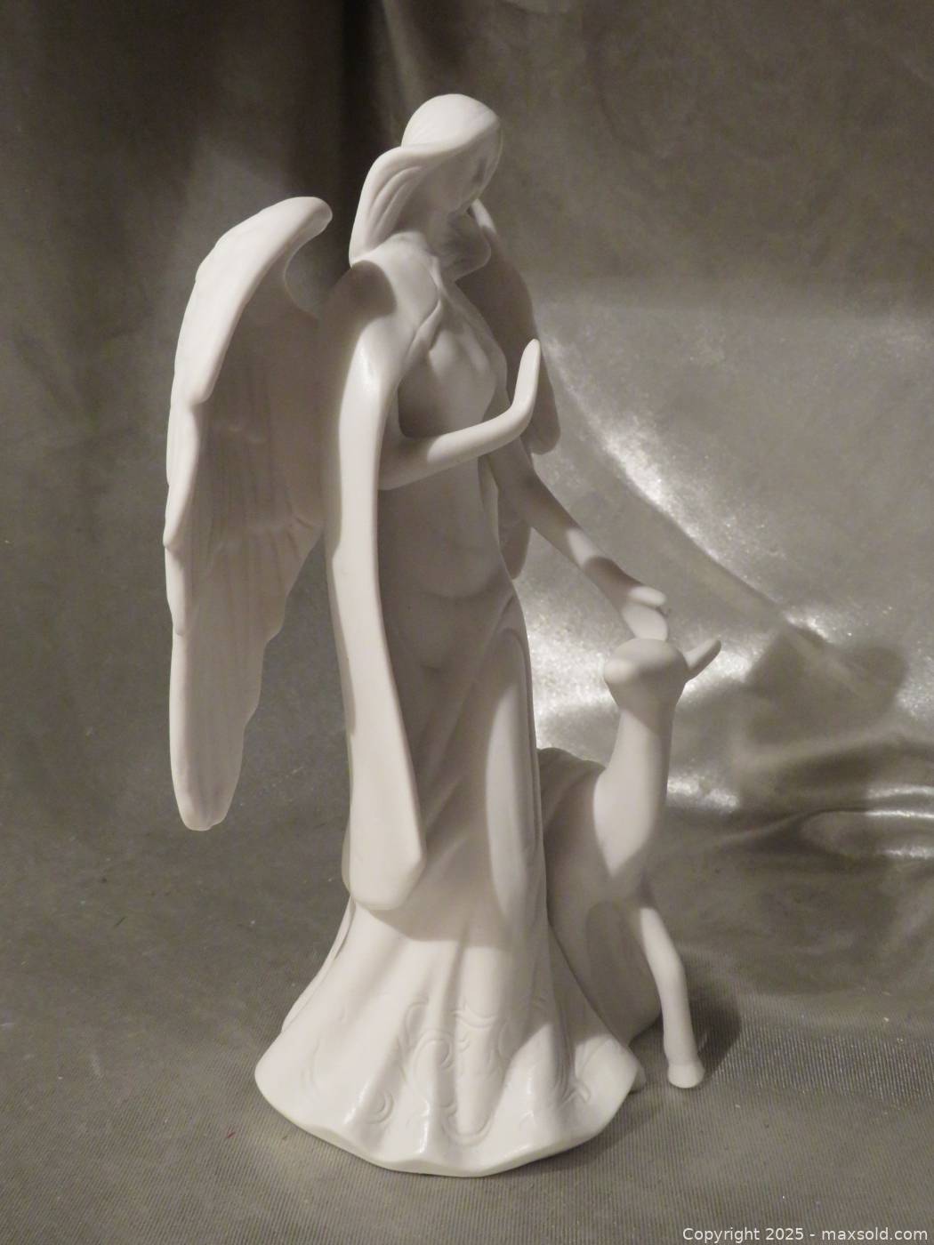 Pacific Rim matte white angel figurine with fawn | Maxsold