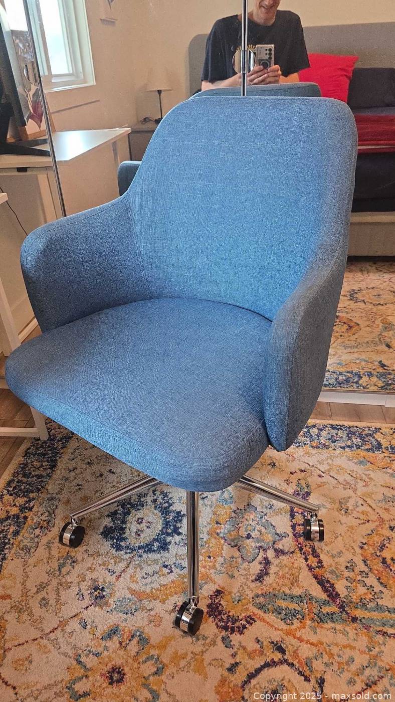 White desk, blue swivel chair, monitor | Maxsold