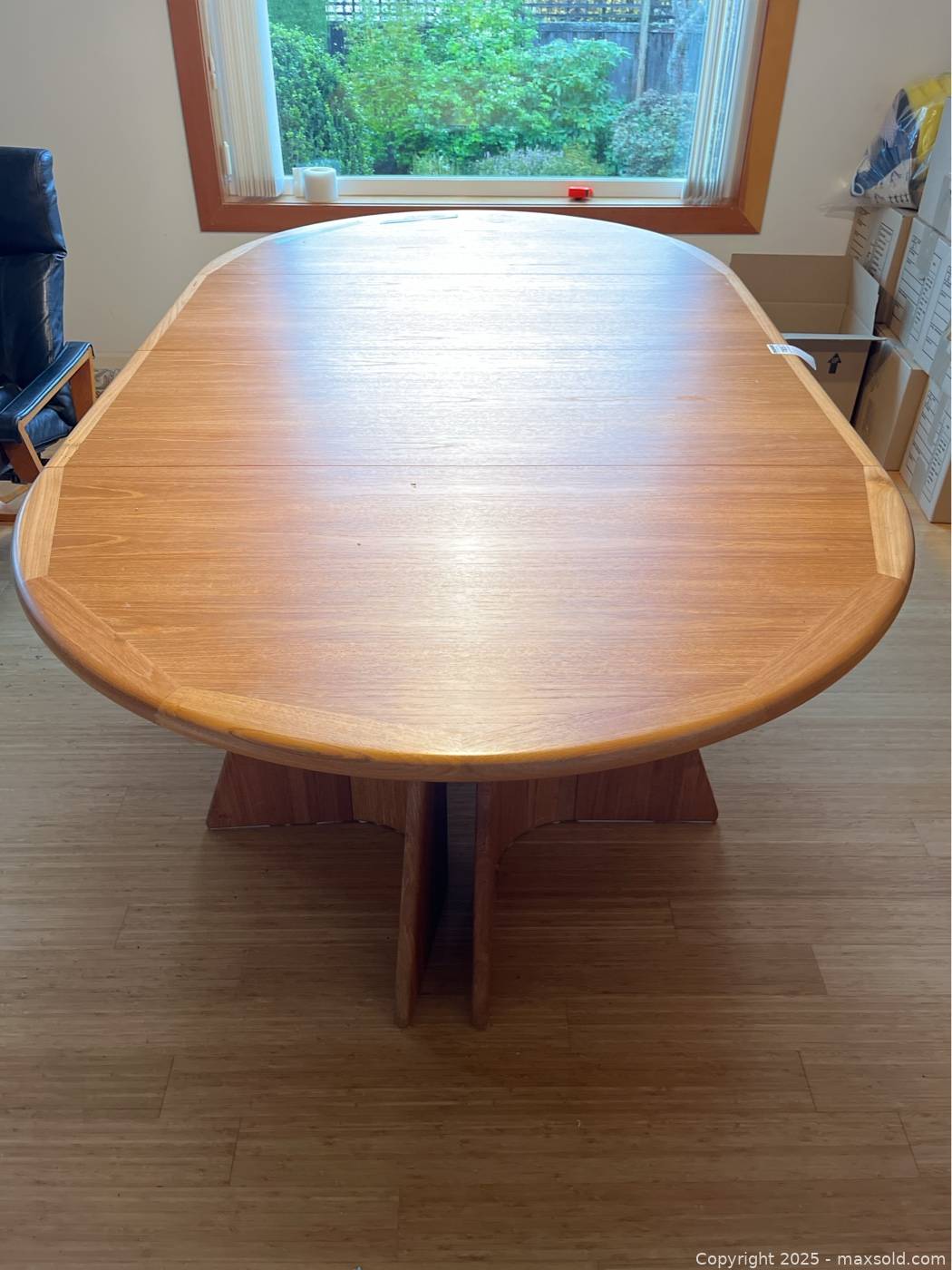 MCM teak extendable dining table with two leaves | Maxsold
