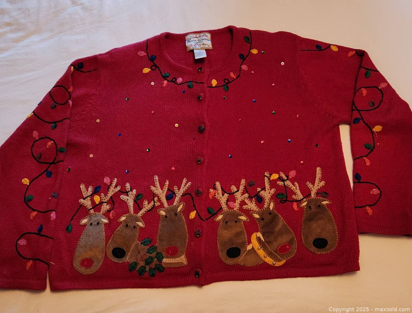 Three ugly Christmas sweaters | Maxsold