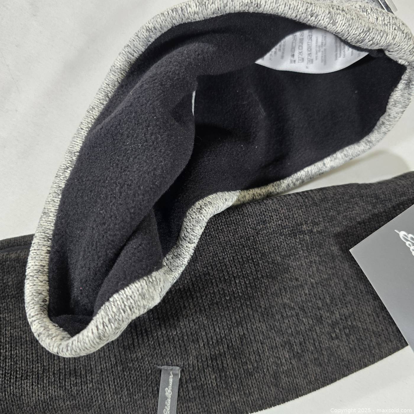 Eddie Bauer crossbody bag, two fleece ear warmer headbands, water bottle carrier | Maxsold