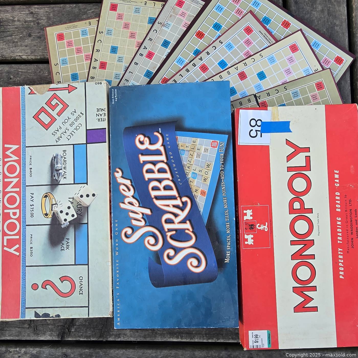 British Monopoly, Monopoly, Super Scrabble and six loose Scrabble ...