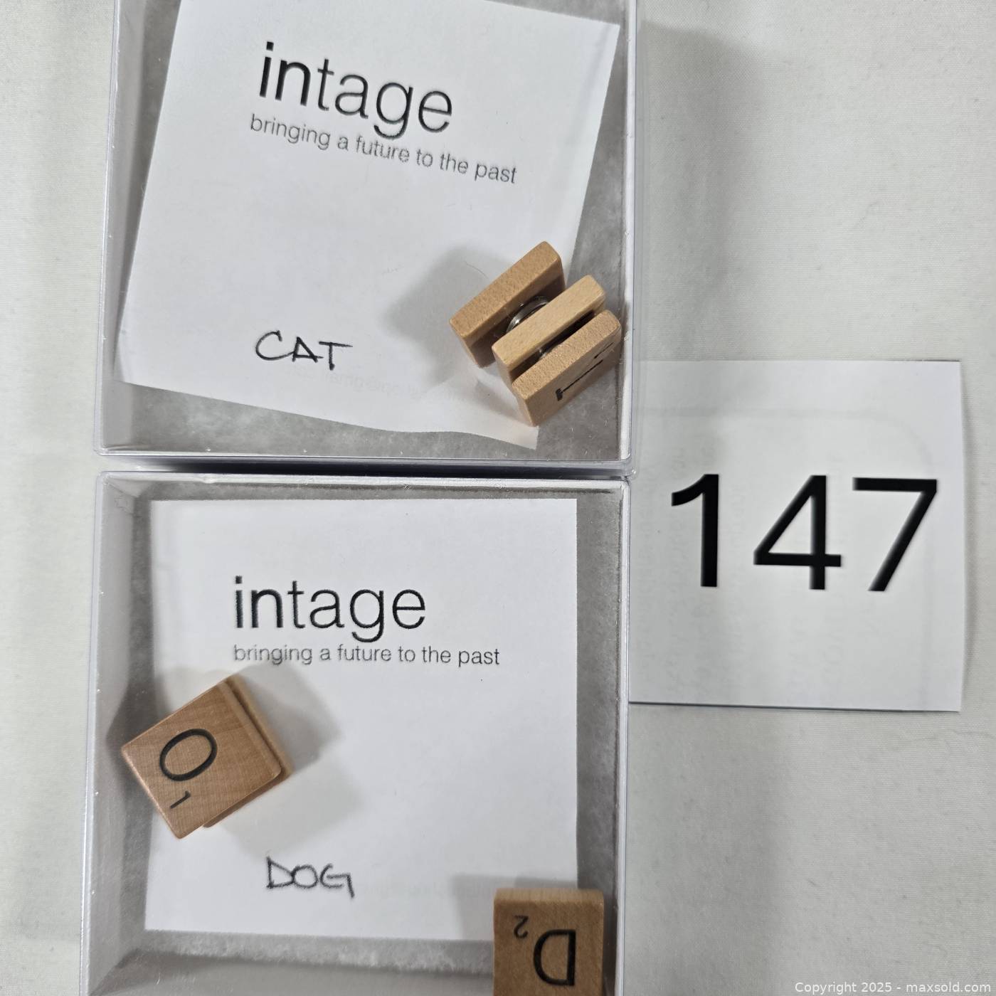 Scrabble tile magnet sets spelling Dog Cat | Maxsold