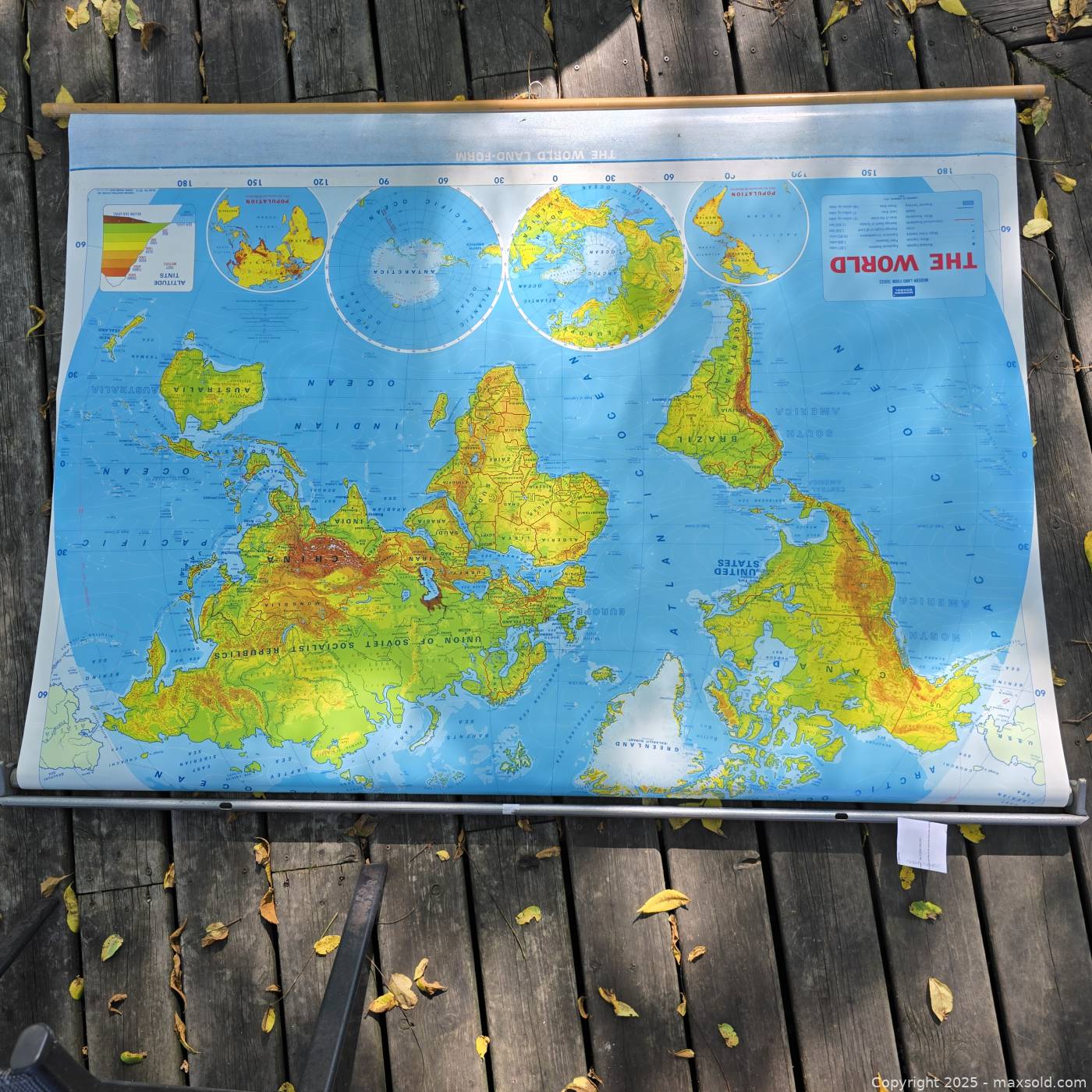 Vintage 1969 roll-down world classroom map | Maxsold