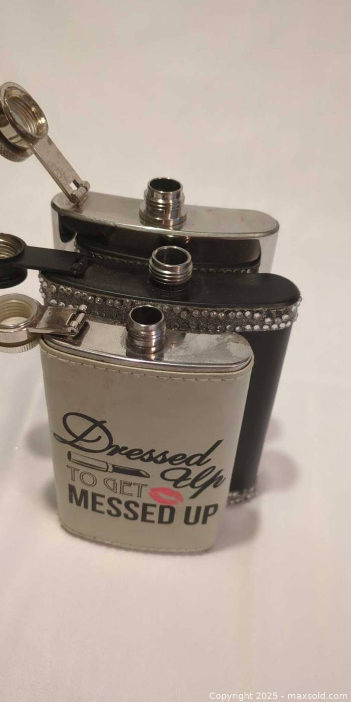 Three Stainless Steel Drinking Flasks | Maxsold