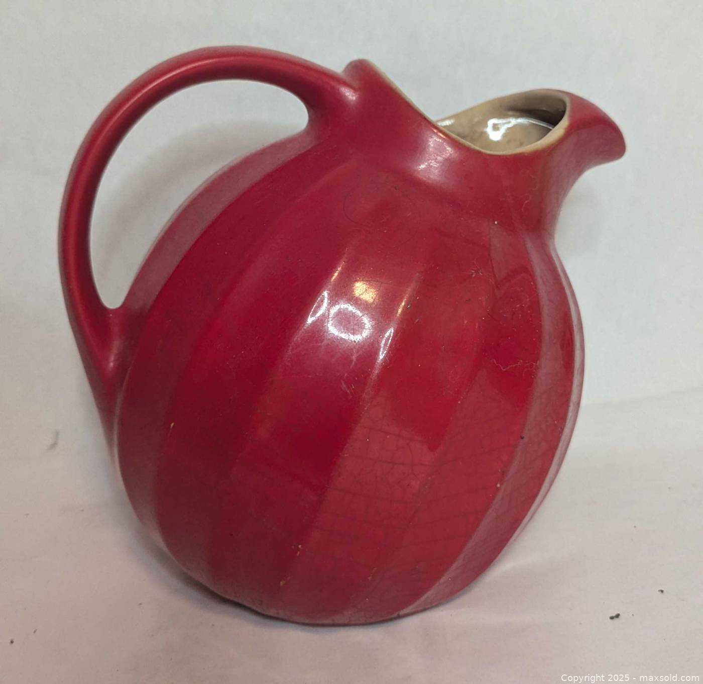 Vintage CG USA Red Ribbed Ball Pitcher | Maxsold