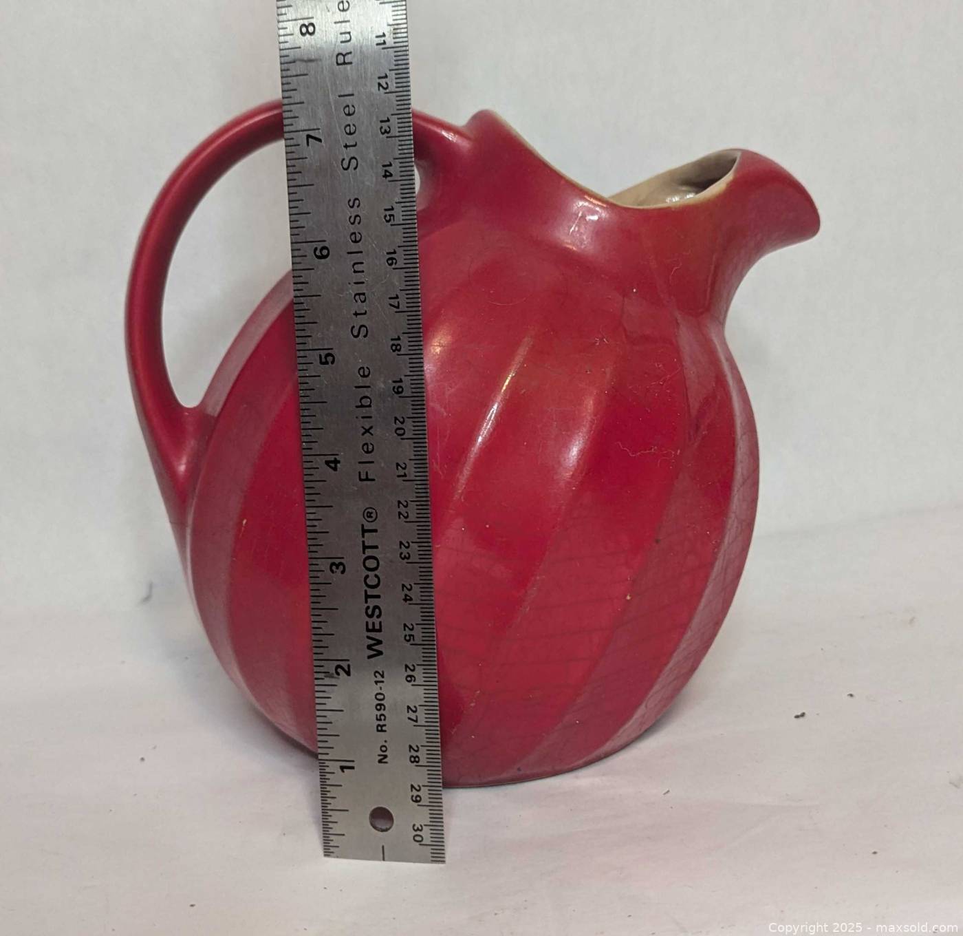 Vintage CG USA Red Ribbed Ball Pitcher | Maxsold