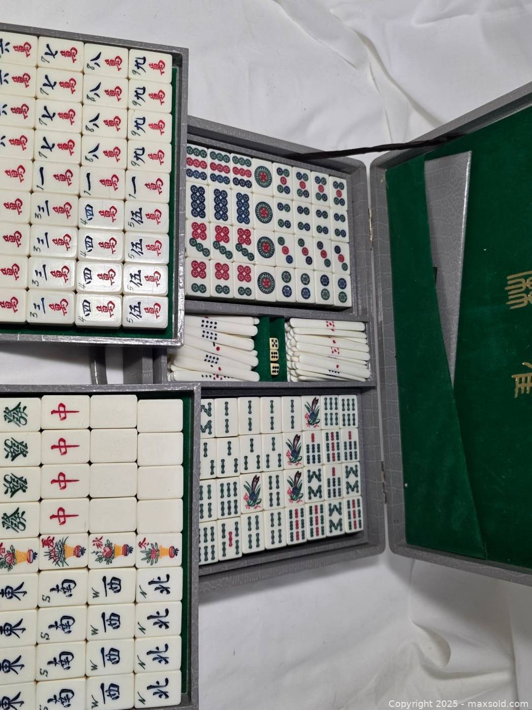 1970s bamboo-back mahjong tile set with case | Maxsold