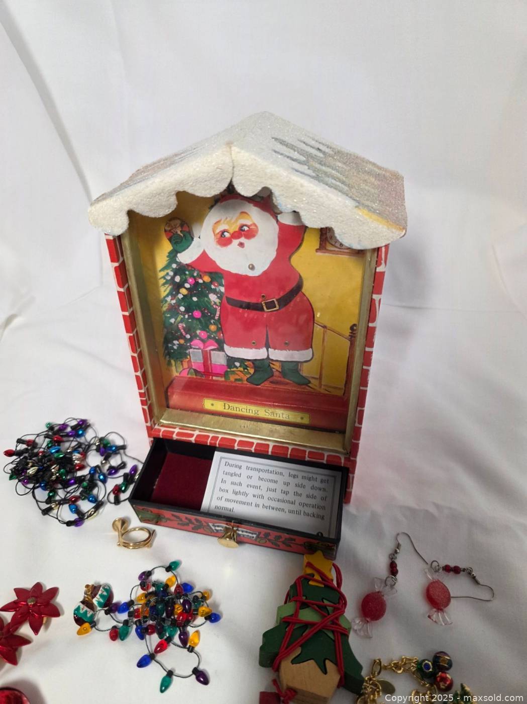 Vintage dancing Santa music box with Christmas costume jewelry | Maxsold