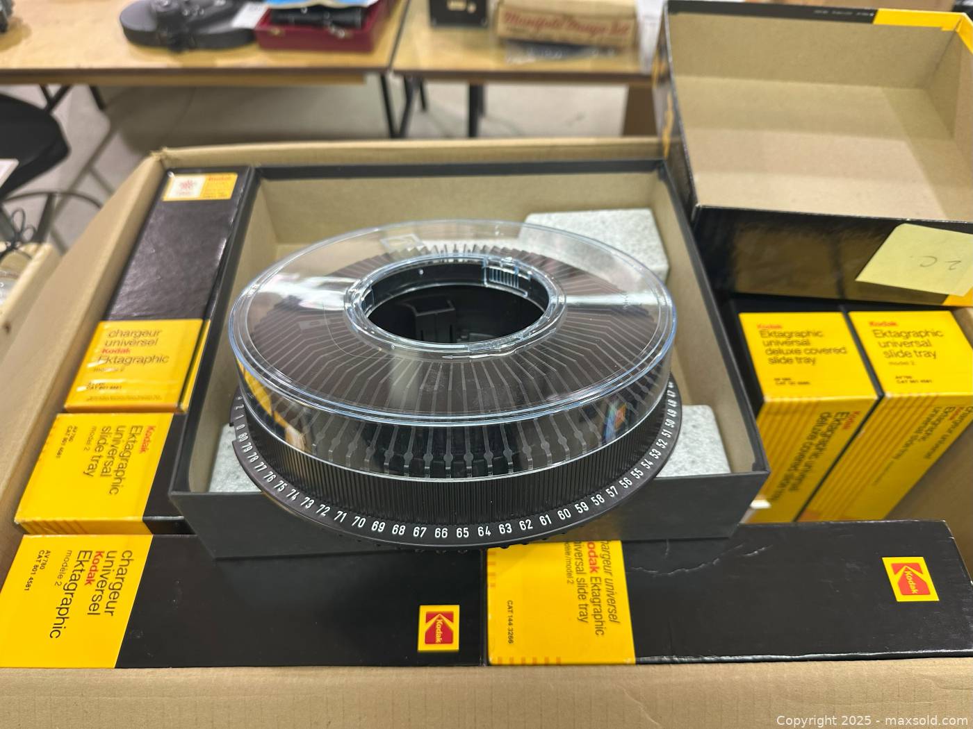 Twelve Kodak 80-slide Ektagraphic trays | Maxsold