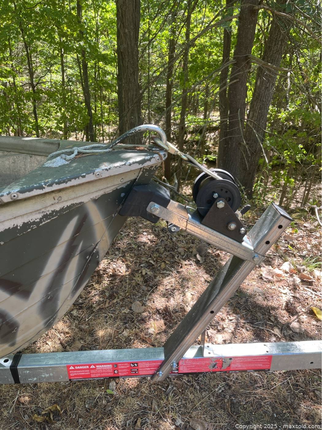 Aluminum rowboat with trailer, oars, anchor, motor, stand | Maxsold
