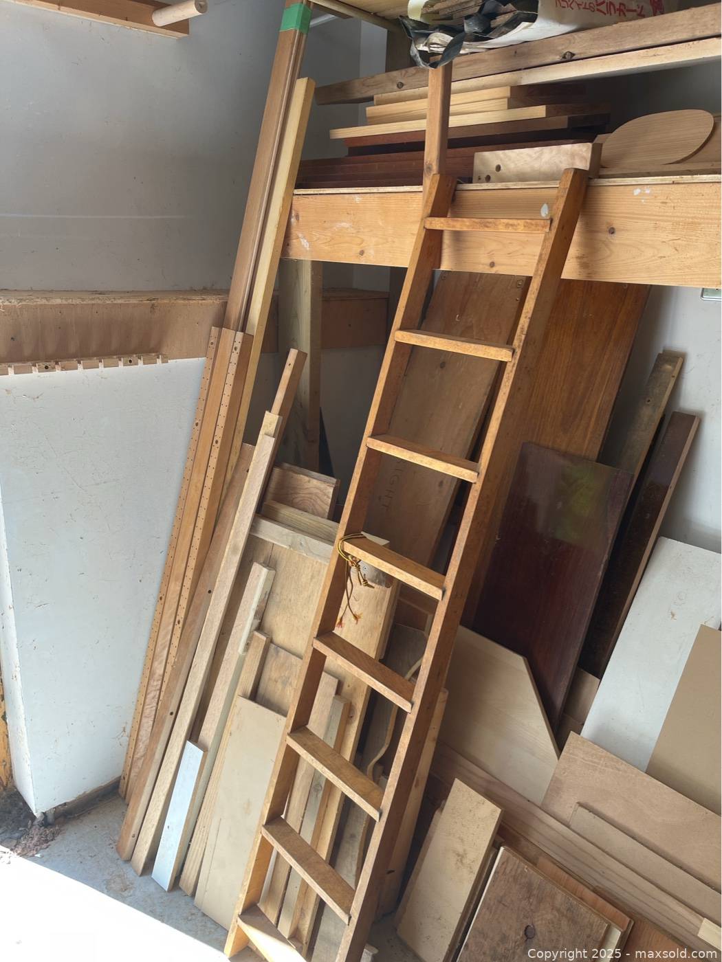 Assorted wood pieces with two small ladders | Maxsold