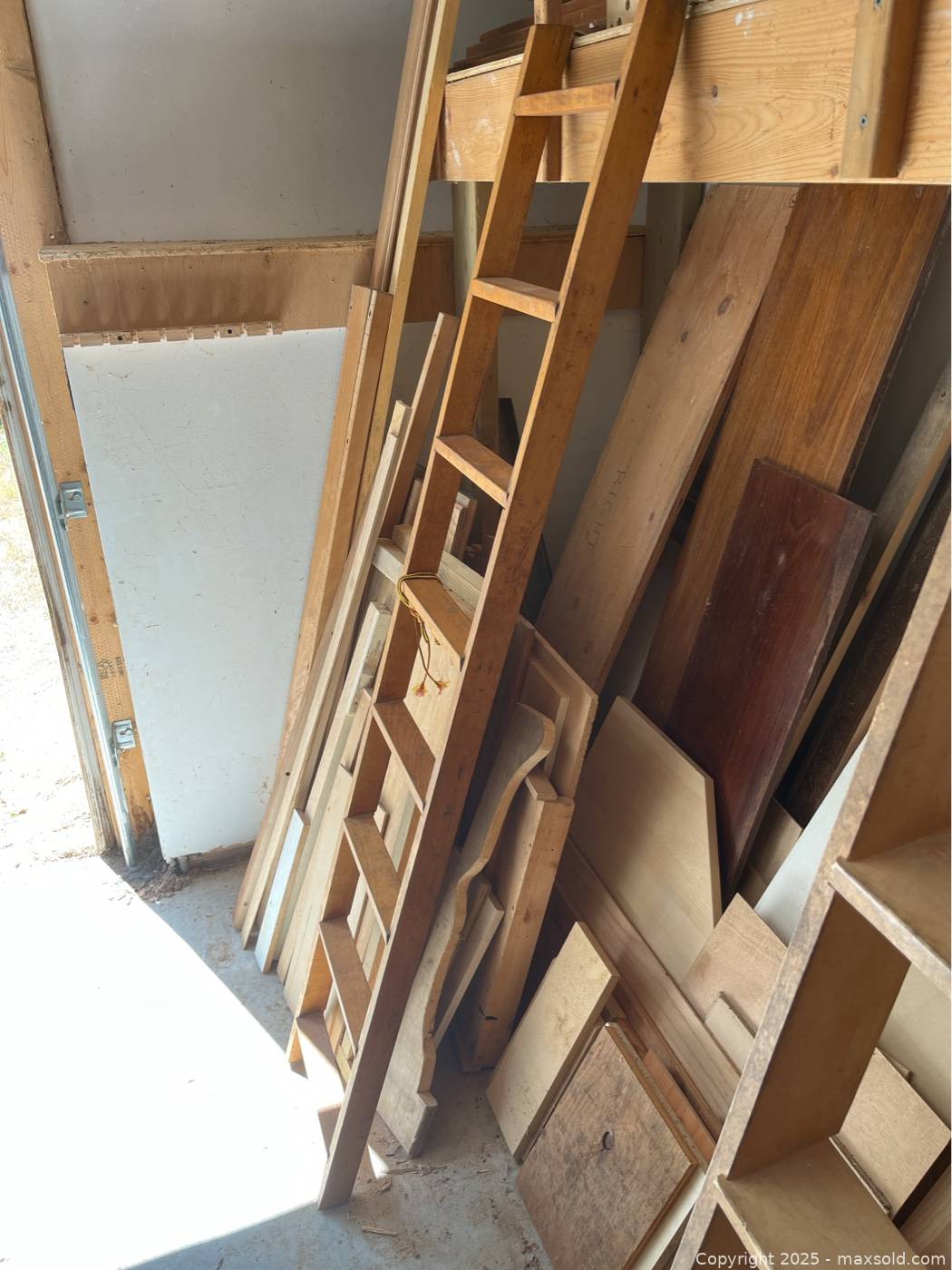 Assorted wood pieces with two small ladders | Maxsold