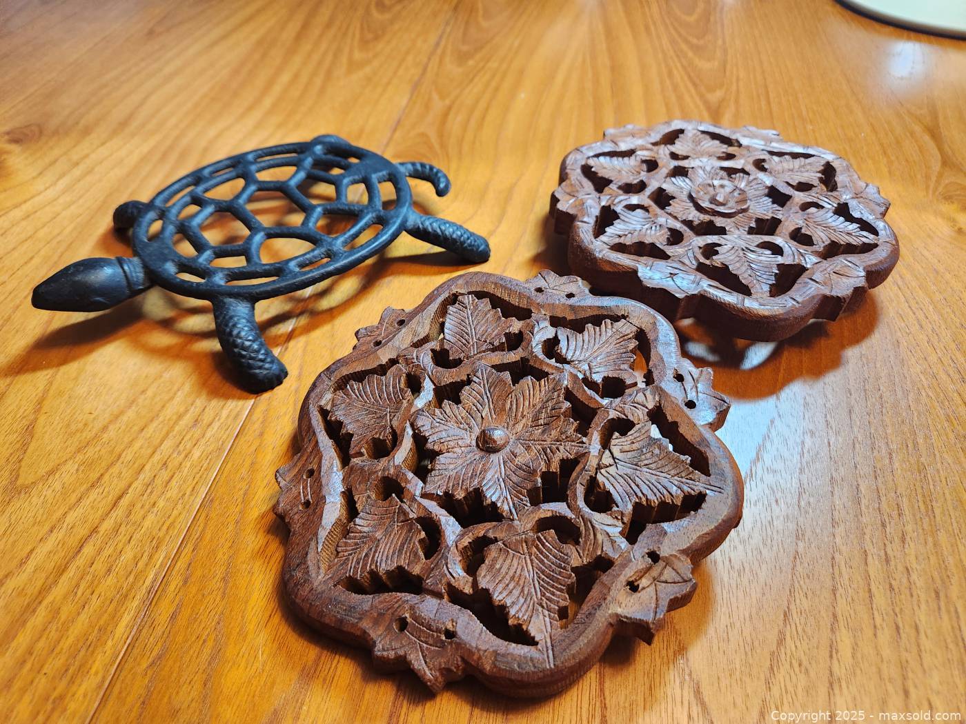 Carved wood and cast iron turtle trivets | Maxsold