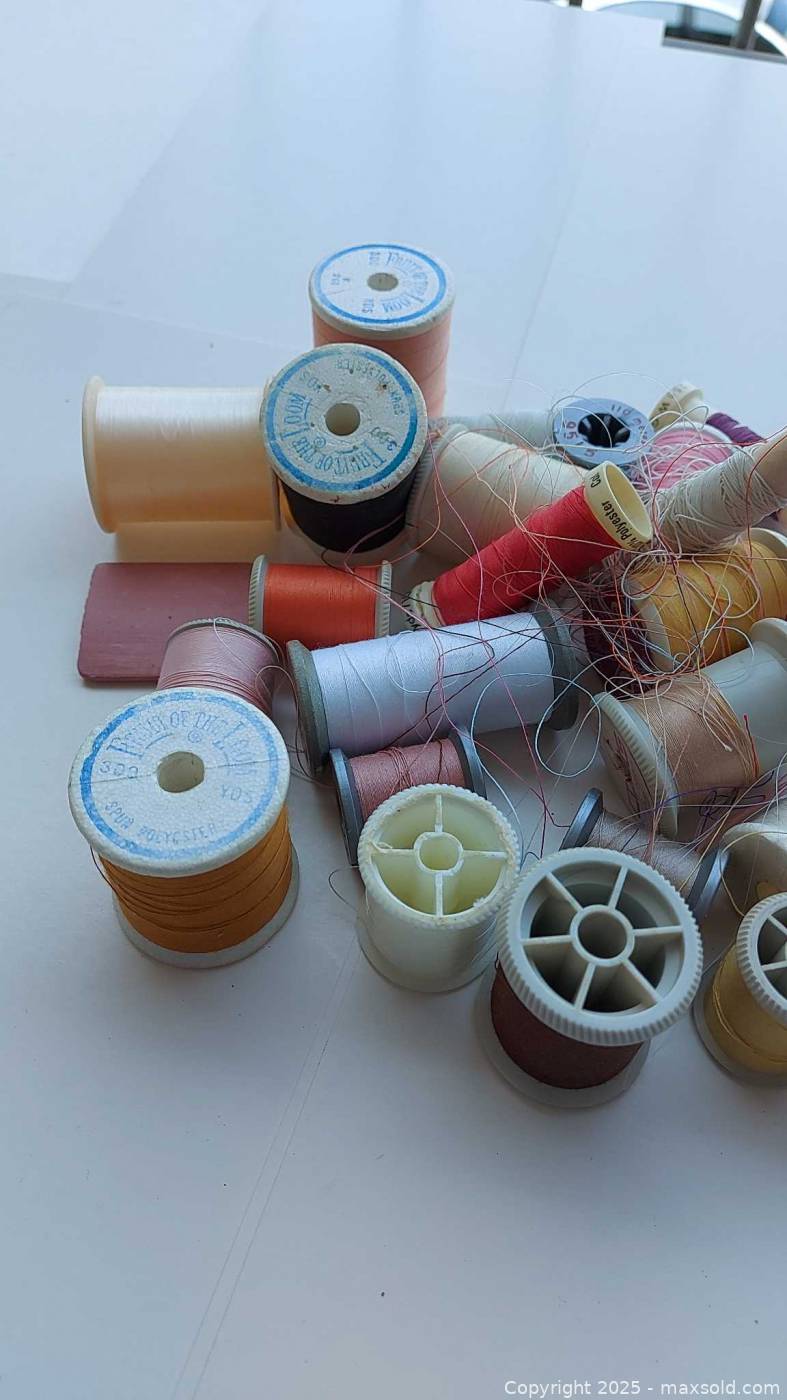 Assorted sewing thread spools, bobbins, tailor’s chalk | Maxsold