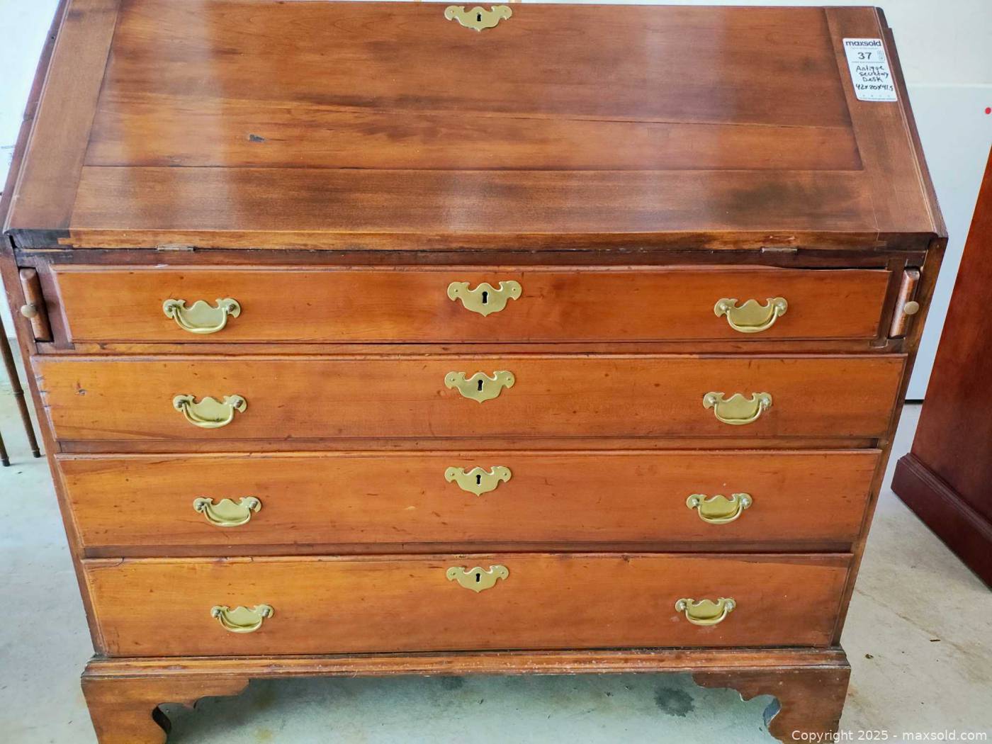 Antique drop-front secretary desk with brass pulls | Maxsold