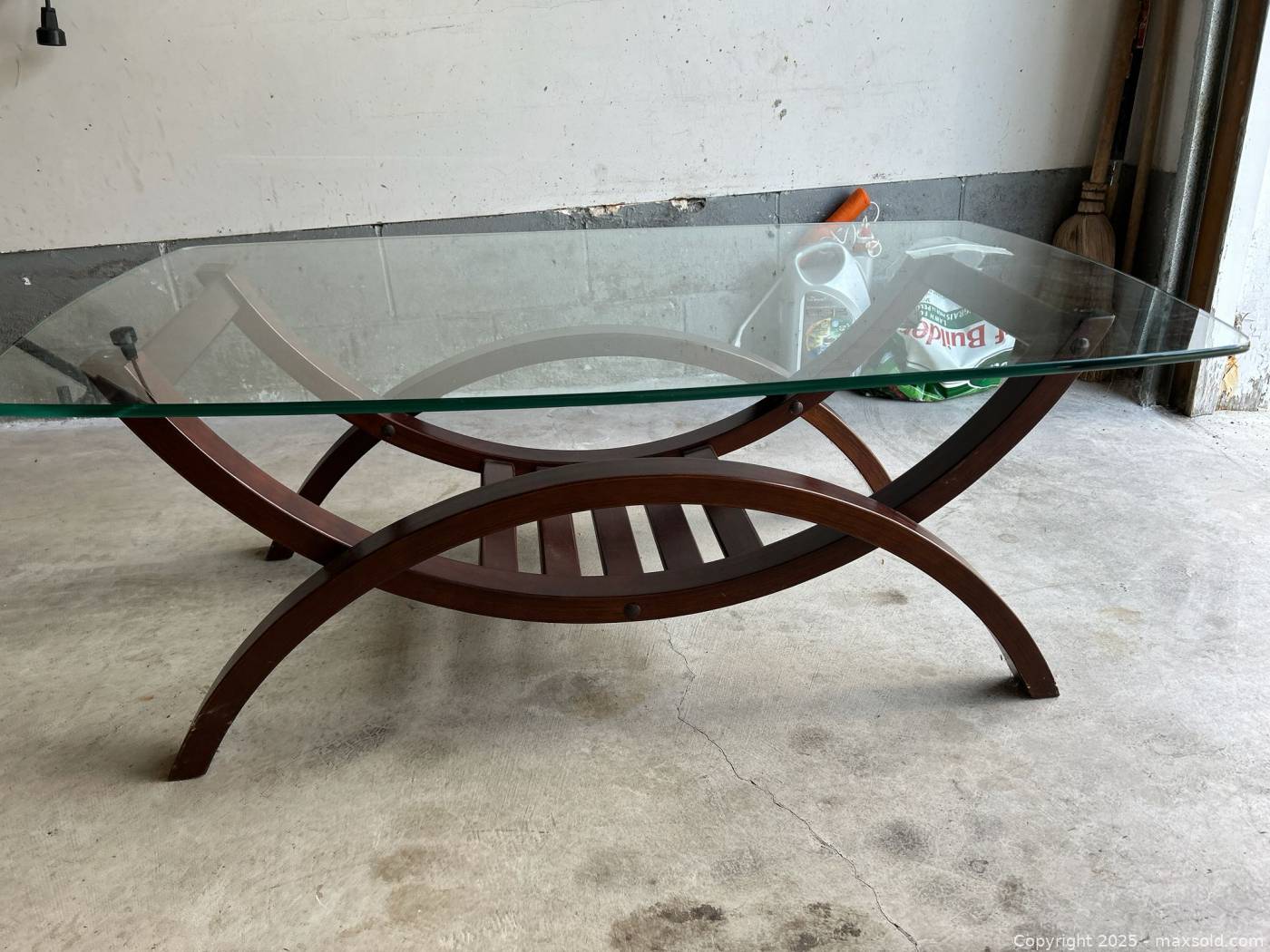 Glass top wood fishbone coffee table | Maxsold