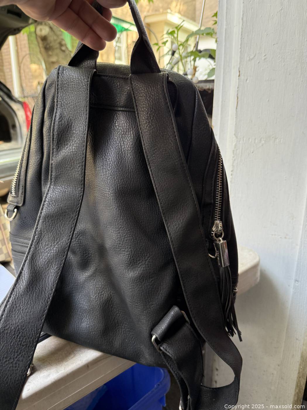 Steve Madden black faux-leather backpack | Maxsold