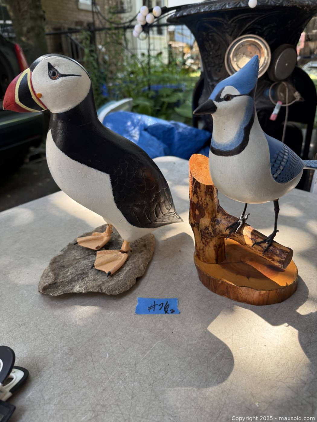 Hand-carved wood puffin and blue jay | Maxsold