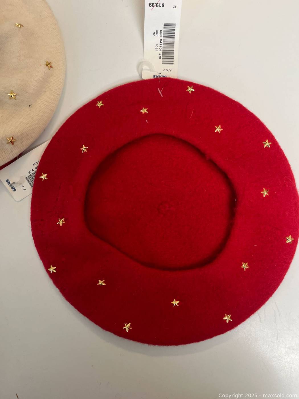 Sears red and white berets with gold stars | Maxsold
