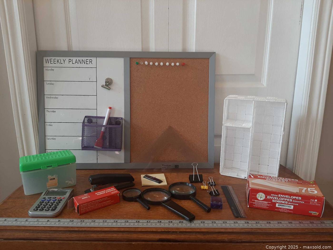 Office supplies lot with planner board, magnifiers, stapler, calculator ...