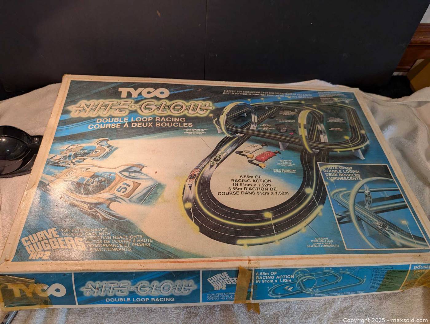 Tyco Nite Glow Double Loop Racing slot car track set | Maxsold