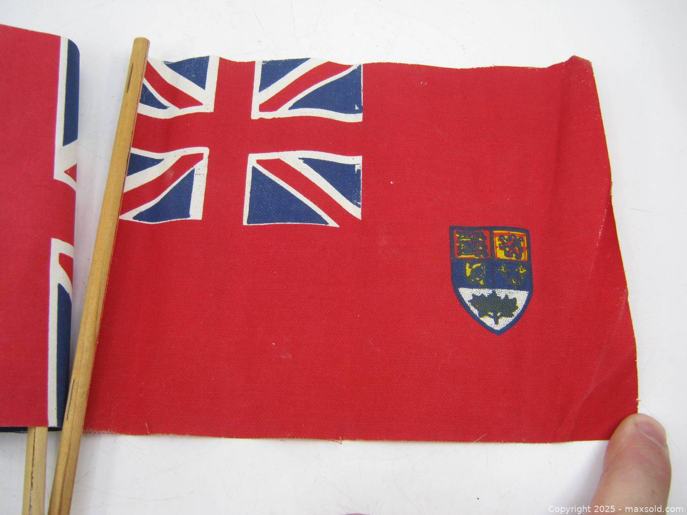 Vintage Union Jack and Canadian Red Ensign hand flags | Maxsold