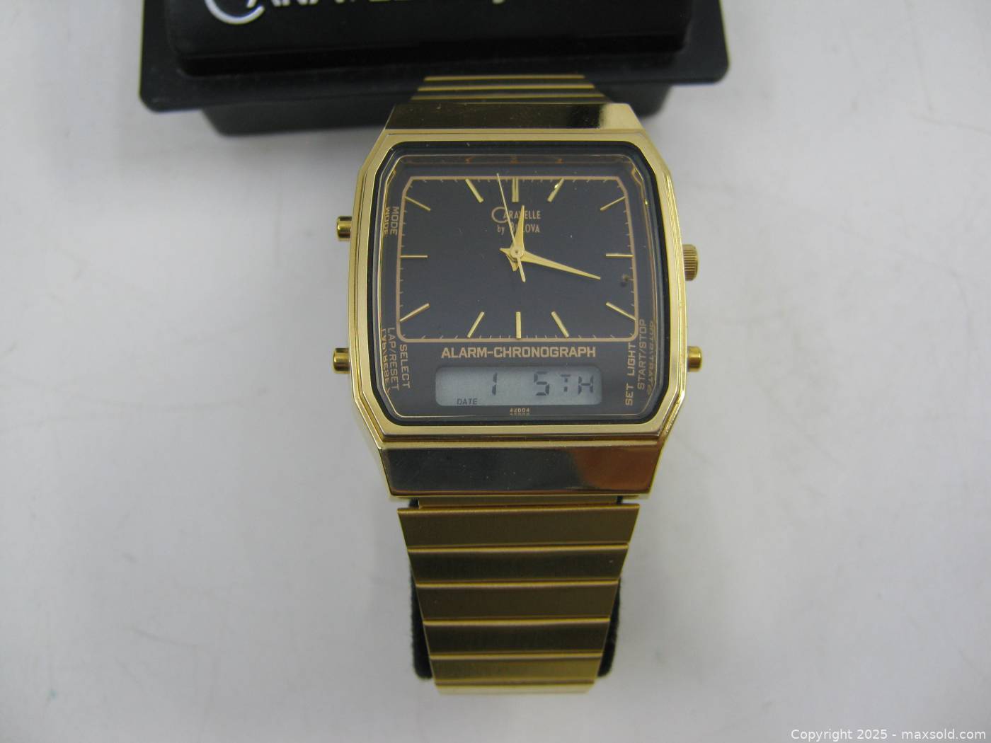 Caravelle by Bulova alarm chronograph wrist watch with box | Maxsold