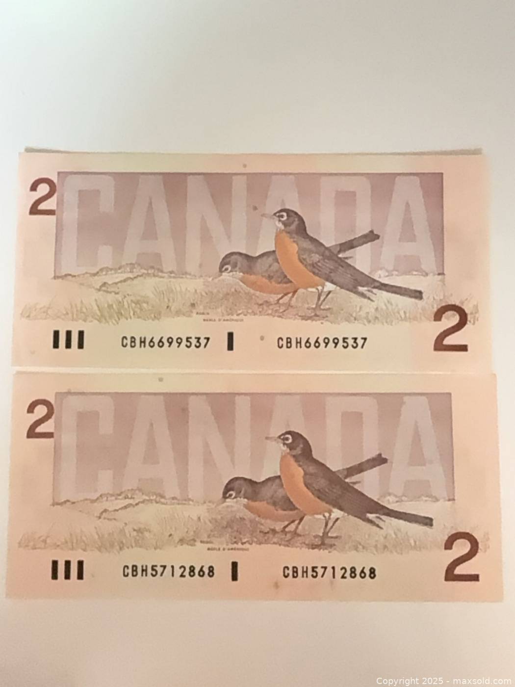 Two 1986 Canadian $2 Bills CBH | Maxsold