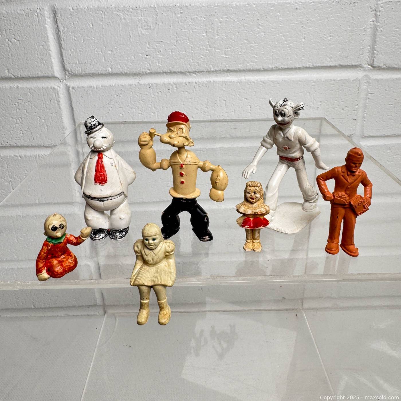 Vintage Comic Strip Plastic Figures, 7 | Maxsold