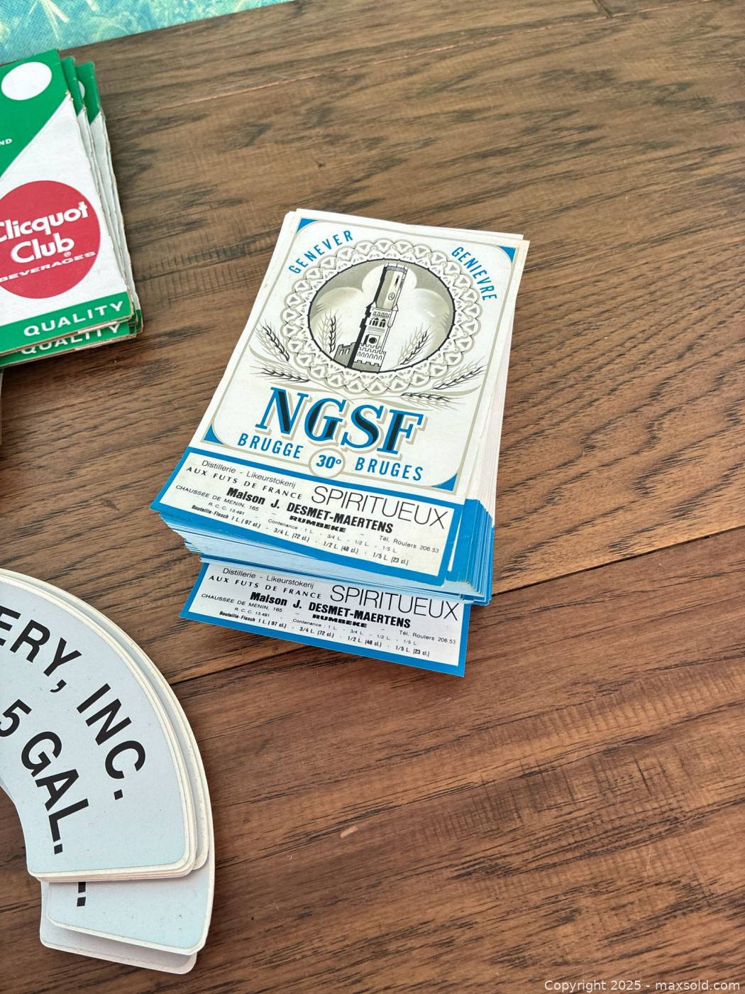 New old stock beverage paper labels and six-pack carriers | Maxsold