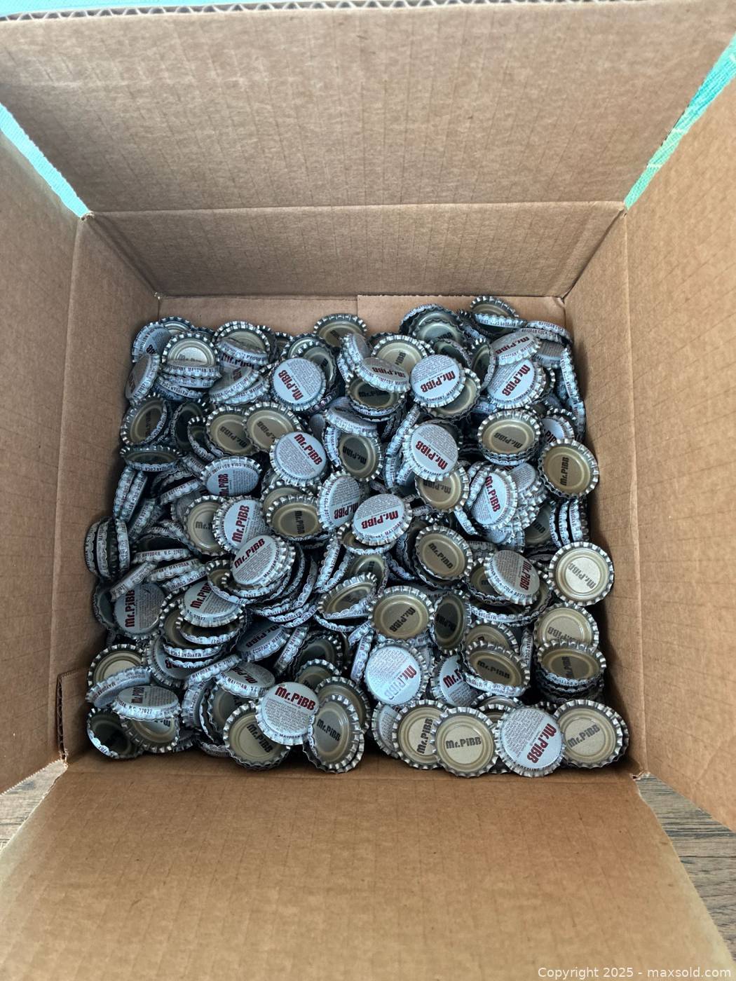 Mr. Pibb Unused Bottle Caps | Maxsold