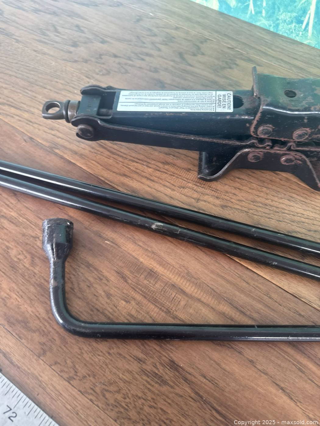 Scissor jack with lug wrench | Maxsold