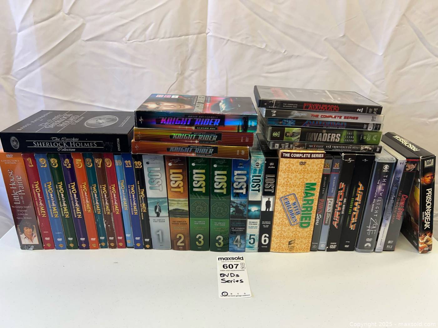 25 TV series DVD box sets | Maxsold