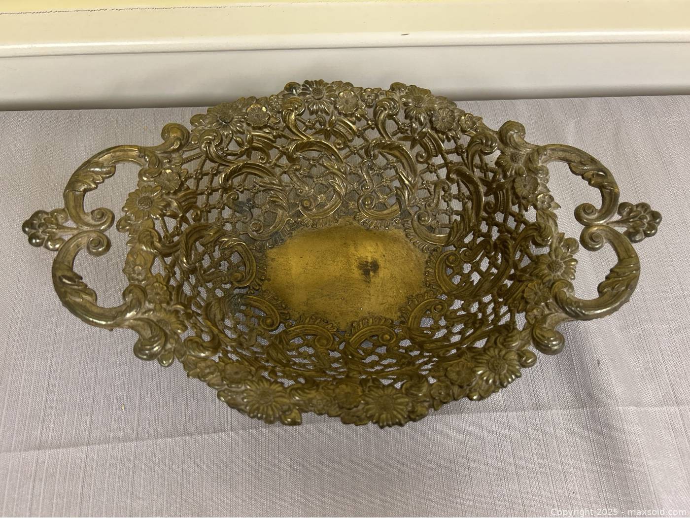 Ornate brass filigree handled basket | Maxsold