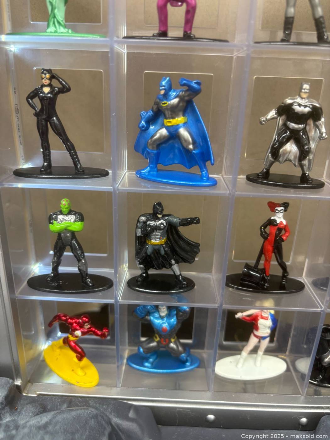 50 DC Comics metal mini figurines with two light-up display cases | Maxsold