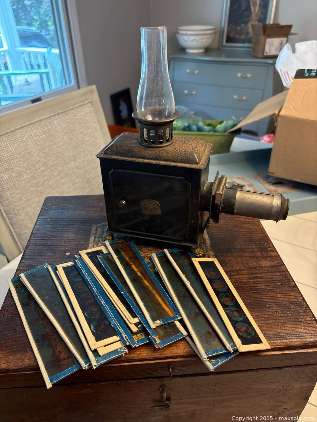 Magic lantern in wood box with 17 slides | Maxsold