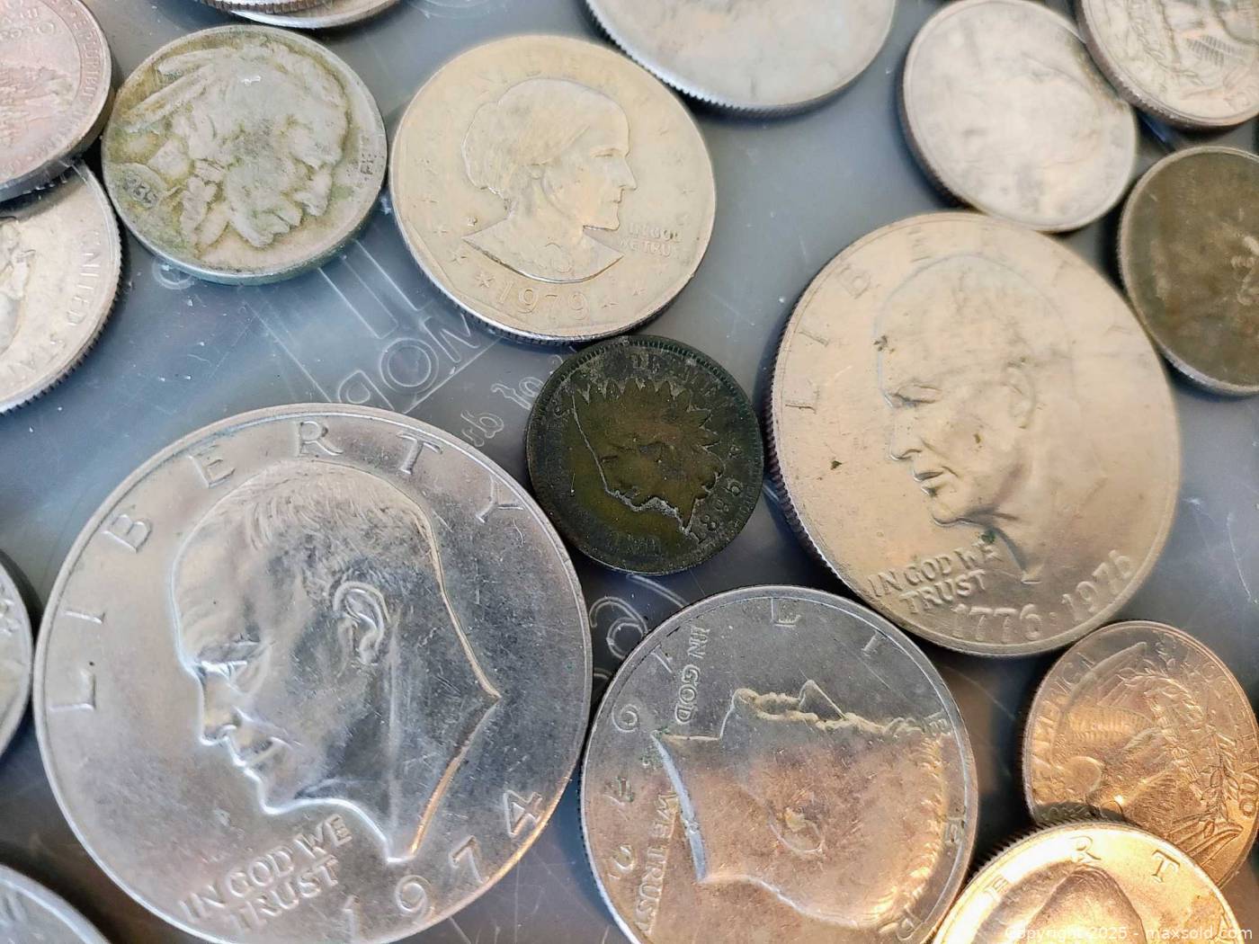 Mixed U.S. coins and 10 sealed BU rolls | Maxsold