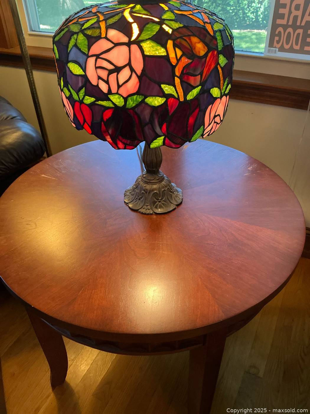 Round wood side table and Tiffany style lamp | Maxsold