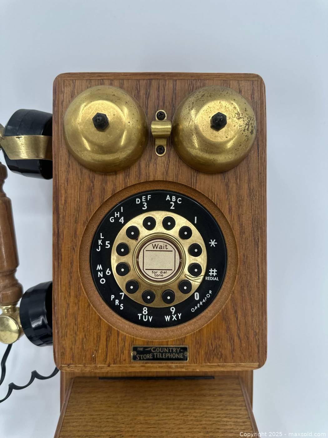 Wooden rotary dial wall telephone | Maxsold