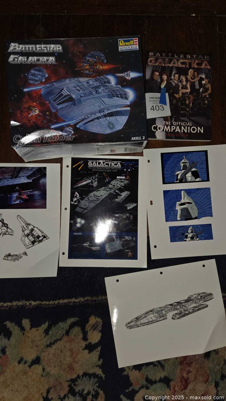 Battlestar Galactica Cylon Raider model kit, book, prints | Maxsold
