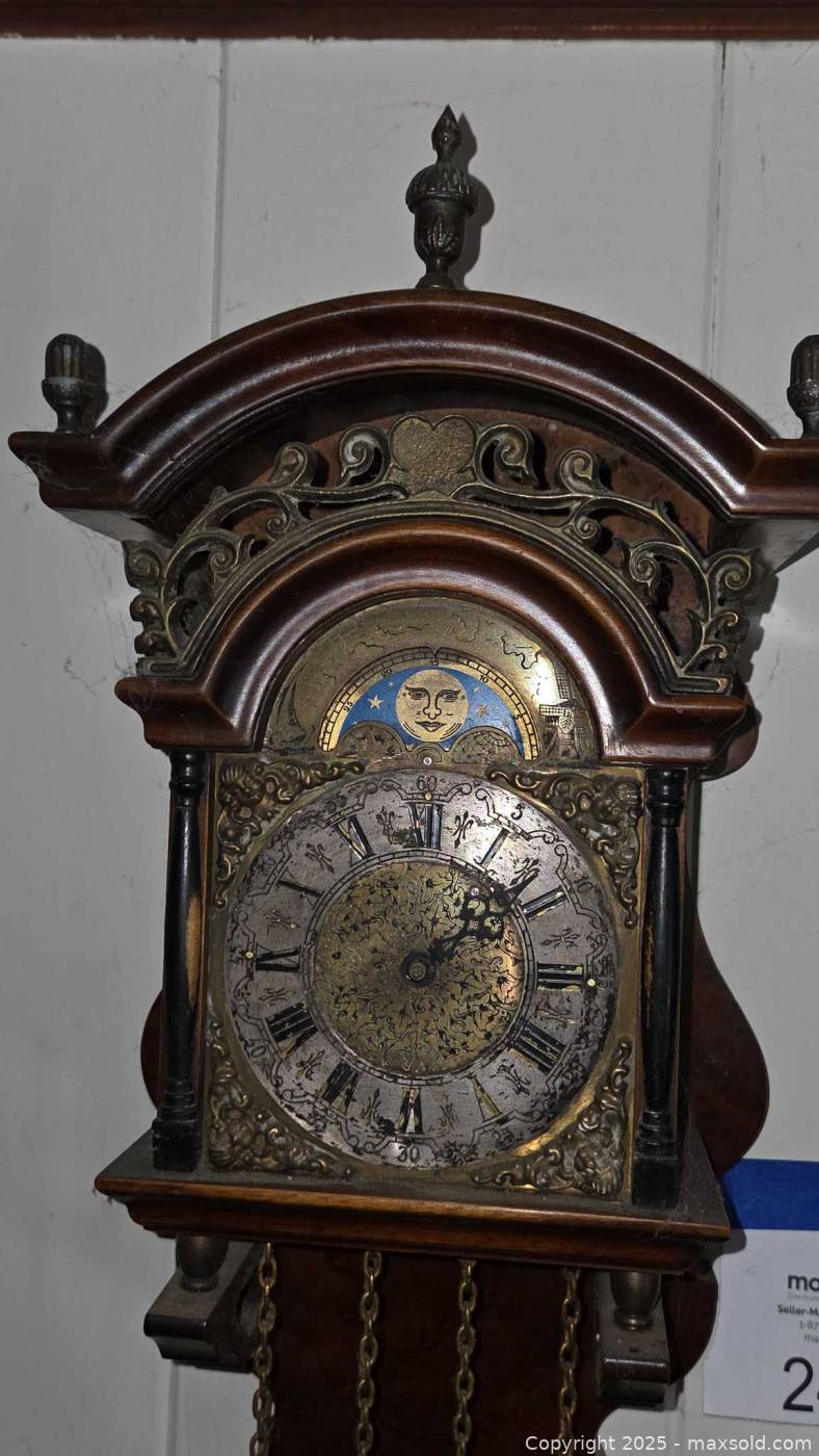 Mechanical weight-driven wall clock with moon phase | Maxsold