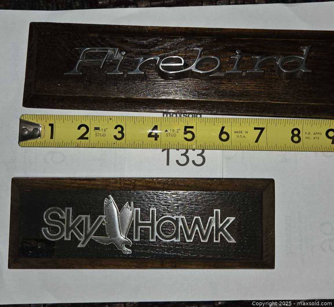 Pontiac Firebird And Buick Skyhawk Emblem Wall Plaques | Maxsold
