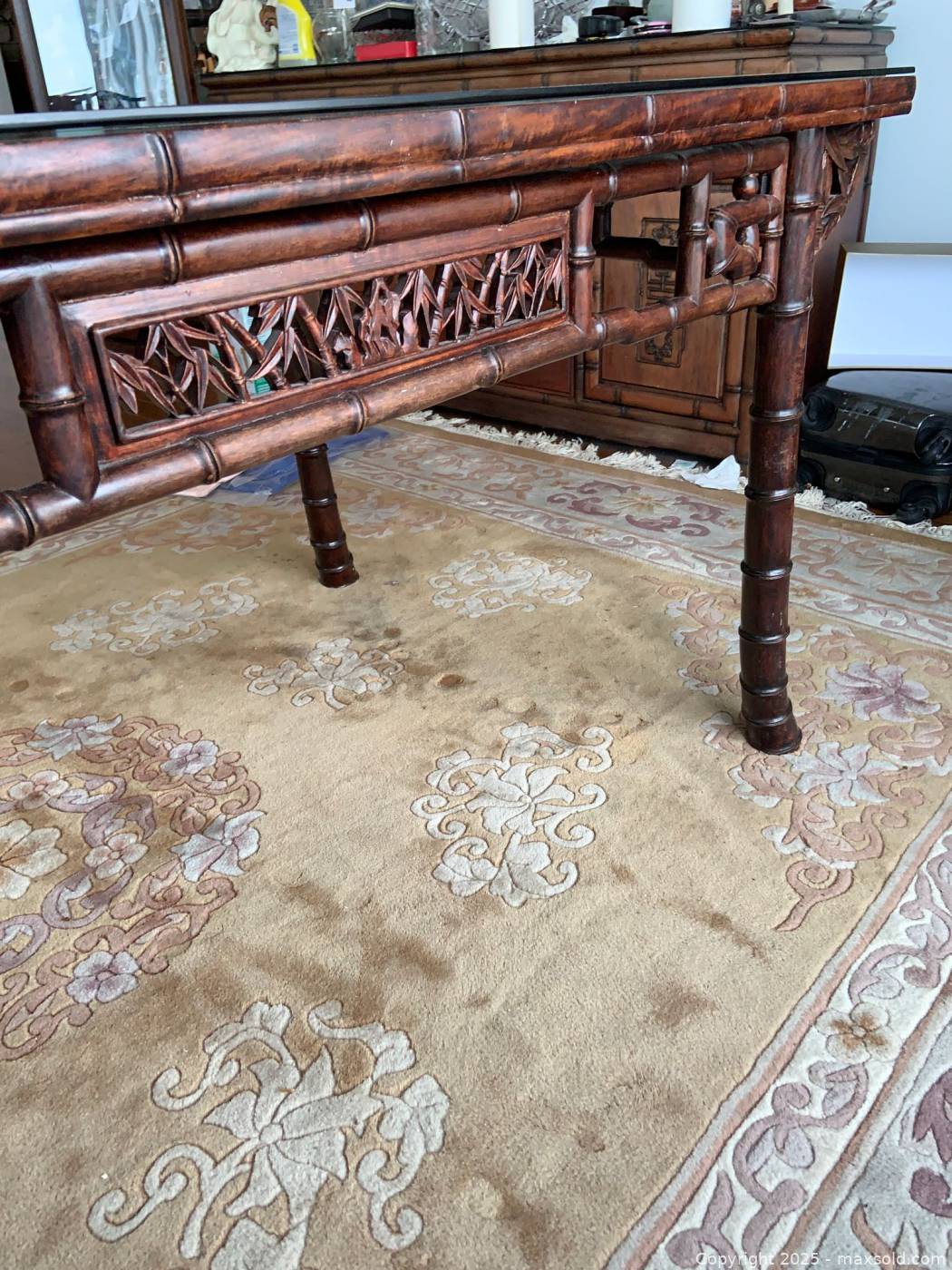 Asian-style solid wood dining table with glass top | Maxsold