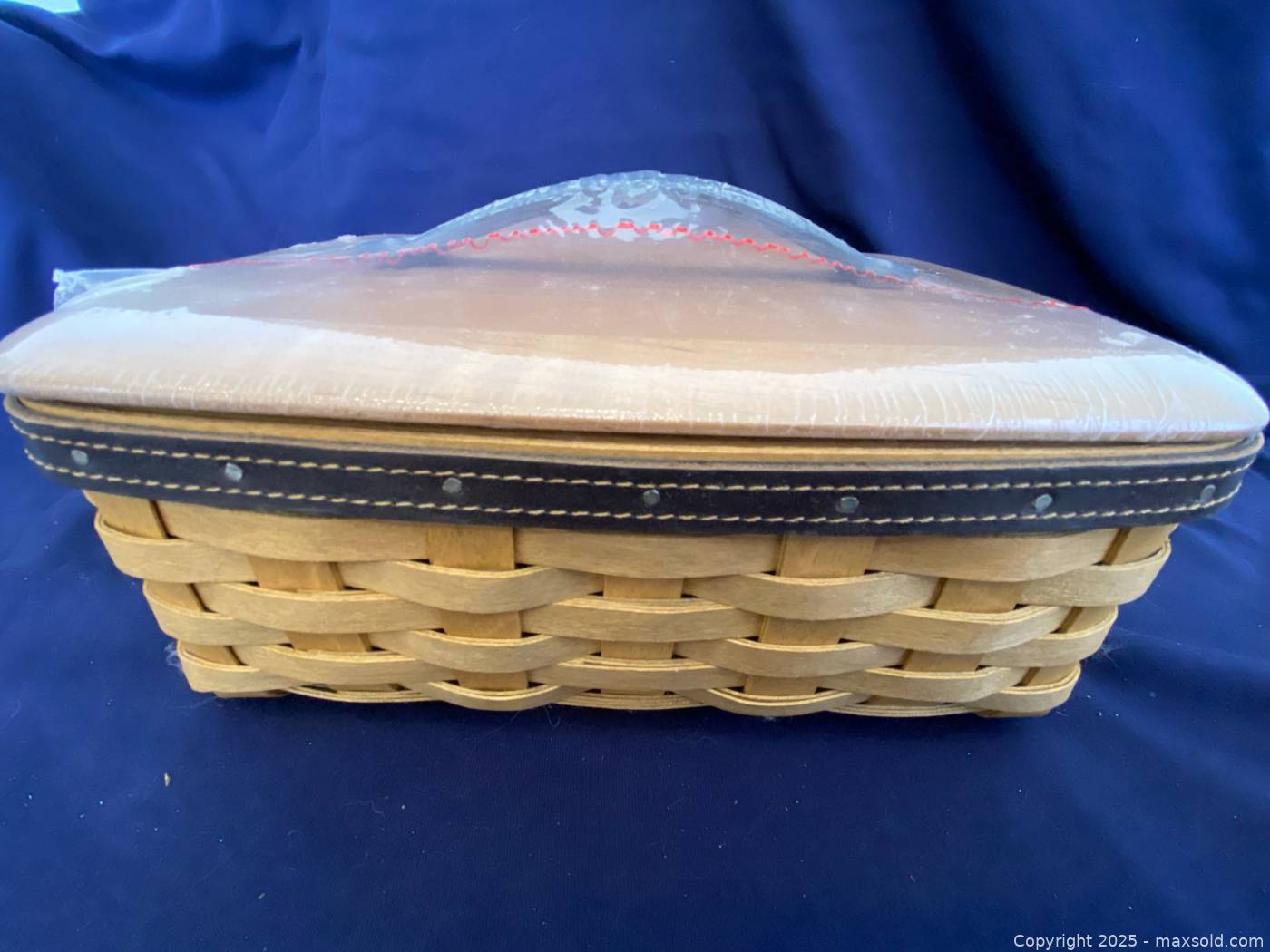 3 signed Longaberger baskets with lids | Maxsold
