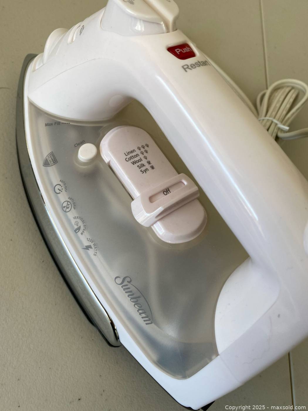 Sunbeam iron and ironing pad | Maxsold