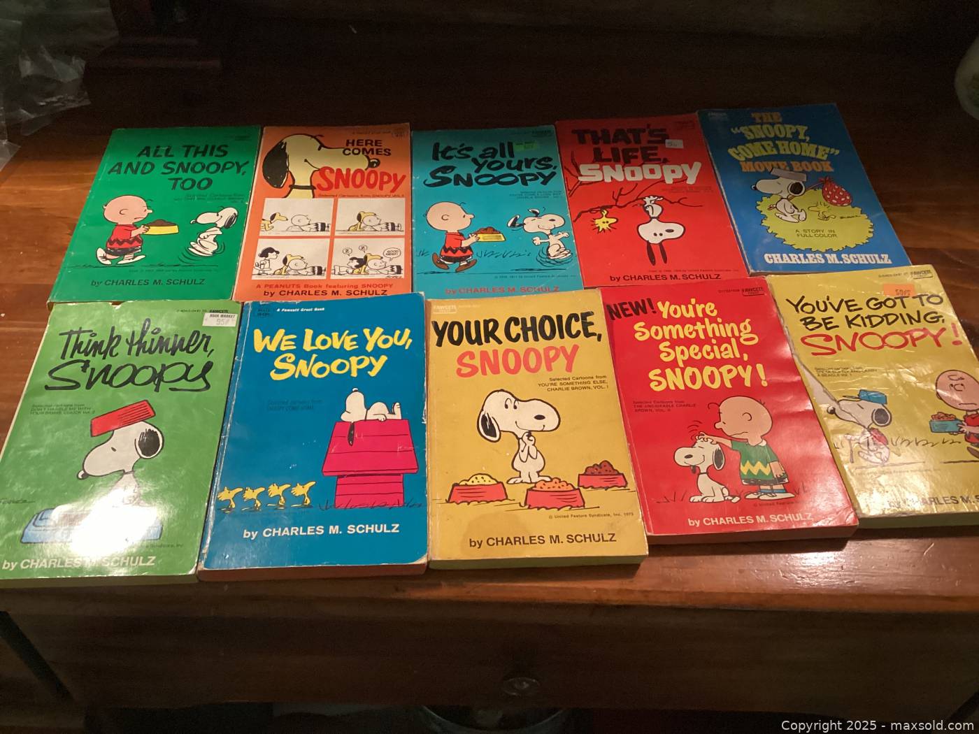 10 vintage Peanuts Snoopy paperbacks | Maxsold