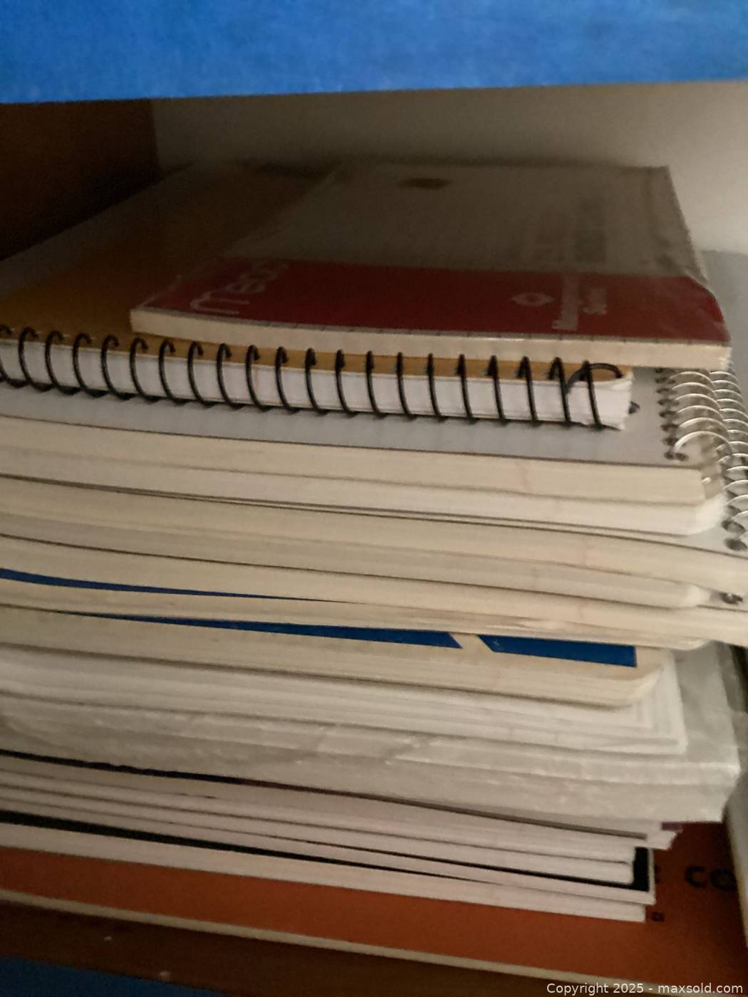Vintage spiral notebooks and loose paper | Maxsold